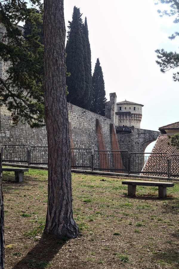 Terrace with Trees and Benches Next To a Boundary Wall of a Castle with ...