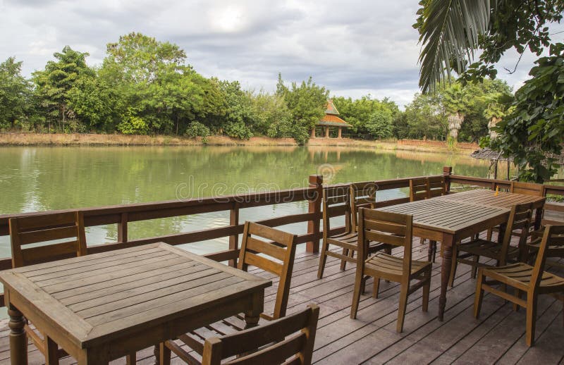 Terrace of Waterfront Restaurant Stock Image - Image of brown, green ...