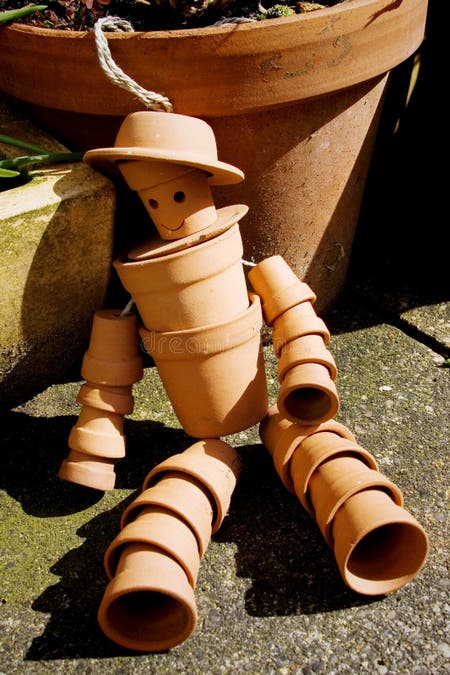 Terracotta flower pot man stock photo. Image of arms - 29809244
