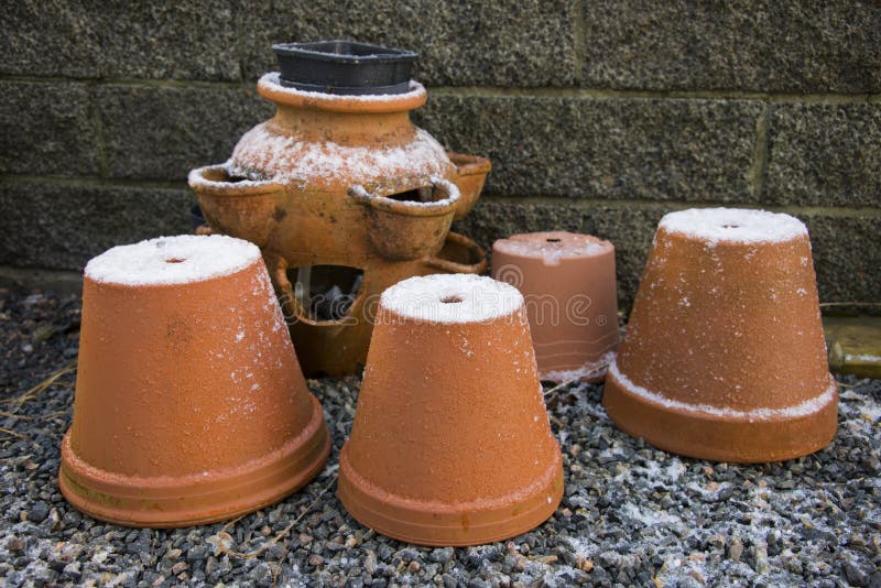Terracotta pots in winter stock image. Image of storage - 38069725