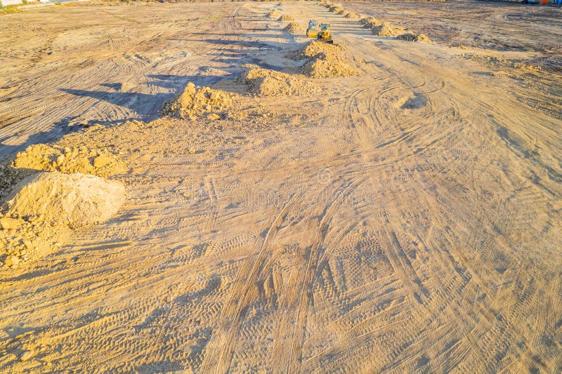 Terrain in Construction Work Moving Earth with Machines with Huge Pile ...