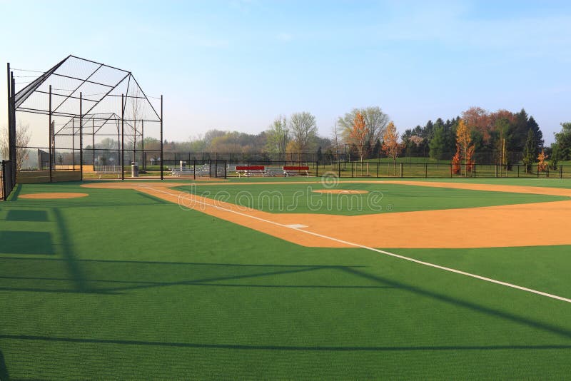 Terrain de baseball image stock. Image du herbe, filet - 23983253