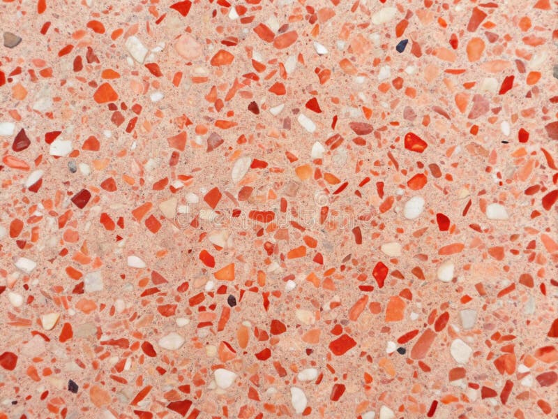 A Terrazzo Surface Featuring a Random Arrangement of Red, Orange, and ...