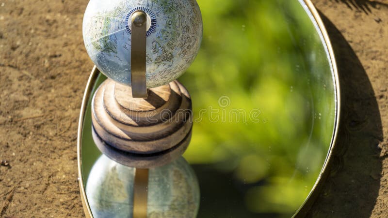 Terrestrial Globe Placed on an Eye-shaped Mirror, Itself Placed on the ...