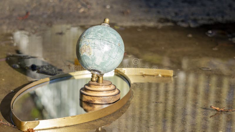 Terrestrial Globe Placed on an Eye-shaped Mirror, Itself Placed on the ...