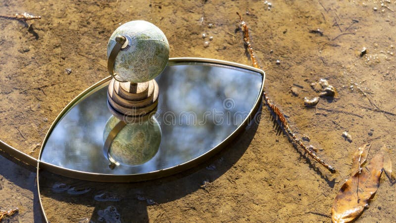 Terrestrial Globe Placed on an Eye-shaped Mirror, Itself Placed on the ...