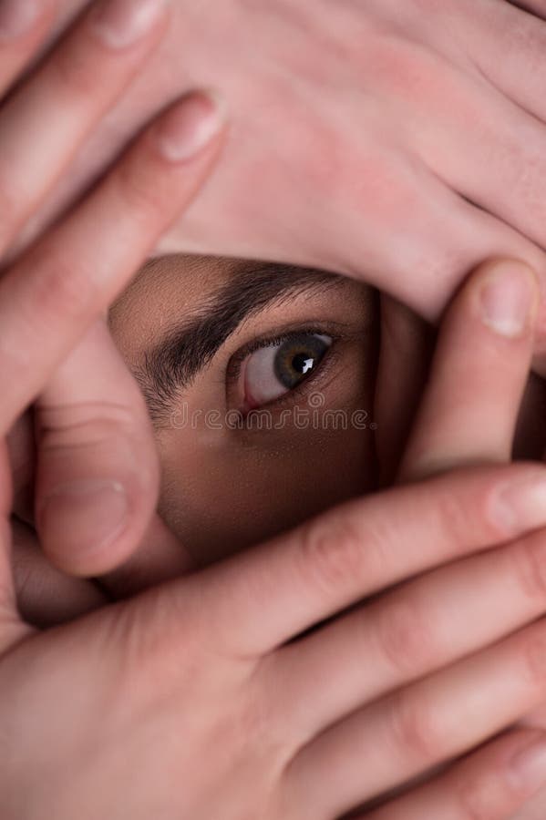 Terrified Look. Close-up of Human Eye Looking through the Human Stock ...