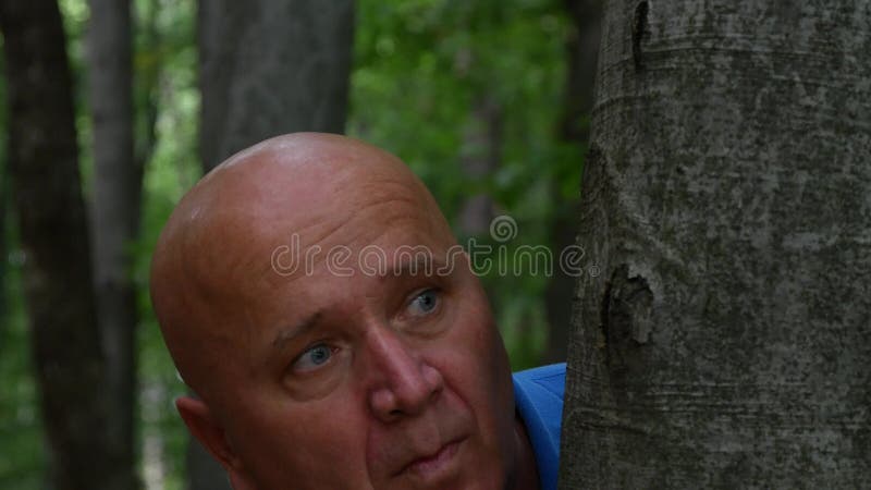 Terrified Man Running Scared and Hiding in the Forest Stock Footage ...
