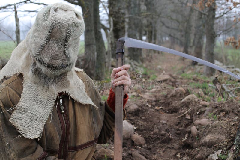Terrifying Masked Man Holding Sharp Weapon in the Forest Stock Image ...