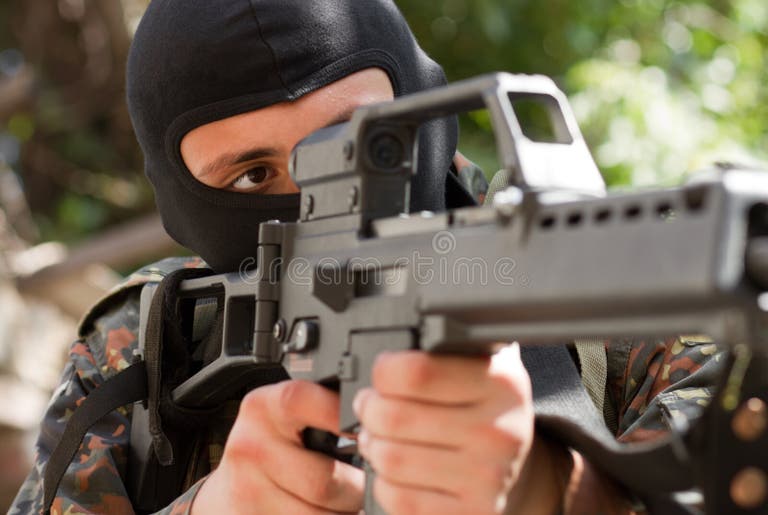 Terrorist in Black Mask with a Gun Stock Image - Image of bright, mask ...