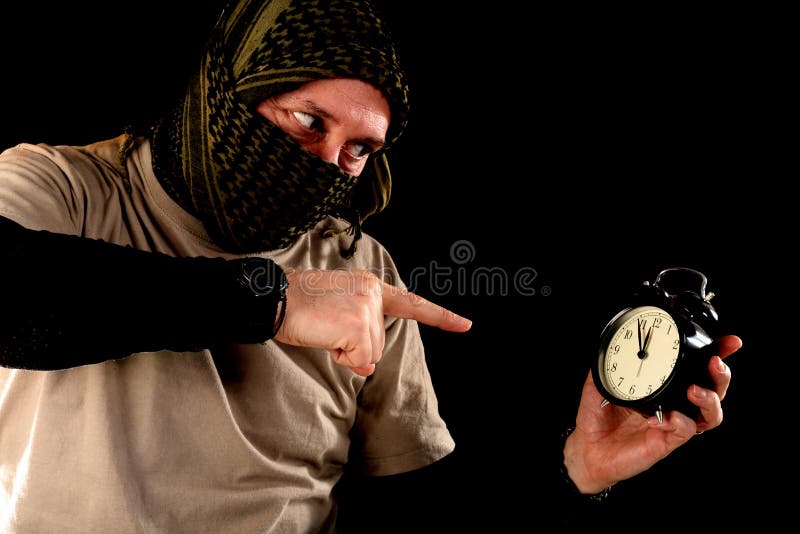 Terrorist with a clock stock image. Image of anonymous - 73423623