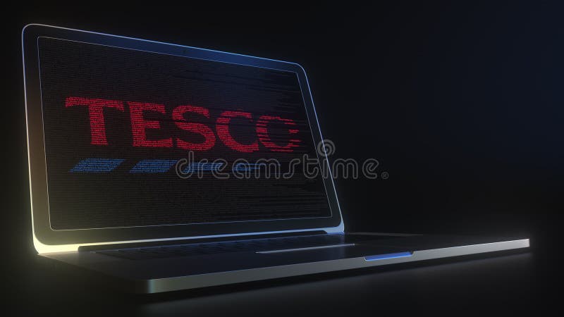 Laptop with Tesco Logo on the Screen. Modern Workplace Conceptual ...