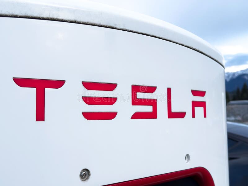 Tesla Charging Station with Iconic Red Logo in Scenic Mountain Setting ...