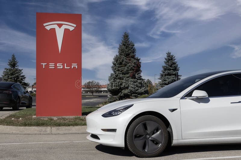 Tesla EV Electric Vehicle Display at a Dealership. Tesla Models Include ...