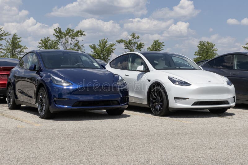 Tesla EV Electric Vehicles Display. Tesla Models Include the Model 3 ...