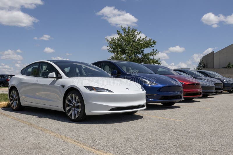 Tesla EV Electric Vehicles Display. Tesla Models Include the Model 3 ...