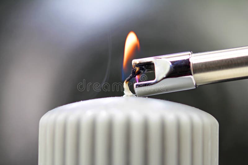 Tesla Lighter Ignites Candle Wick Stock Image - Image of black, candle ...