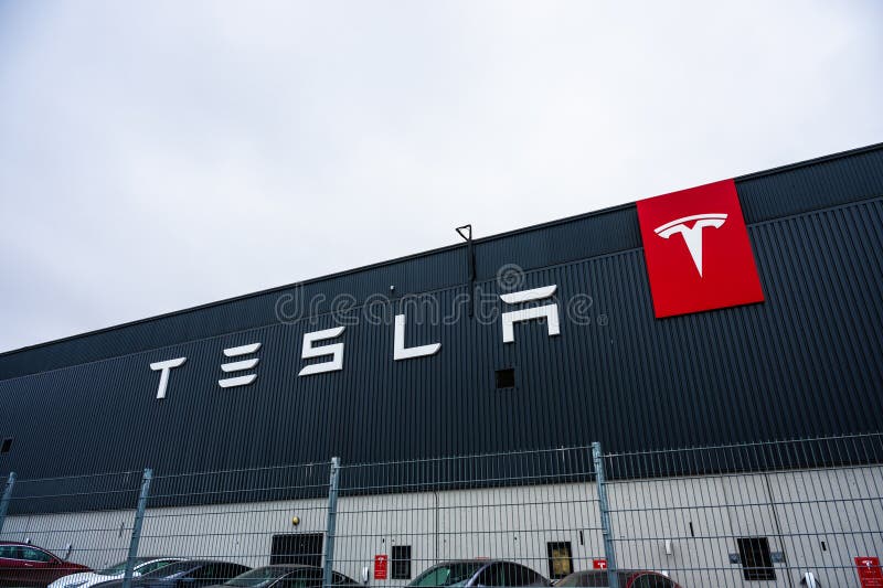 Tesla Logo on the Facade of a Large Workshop.. Editorial Photography ...