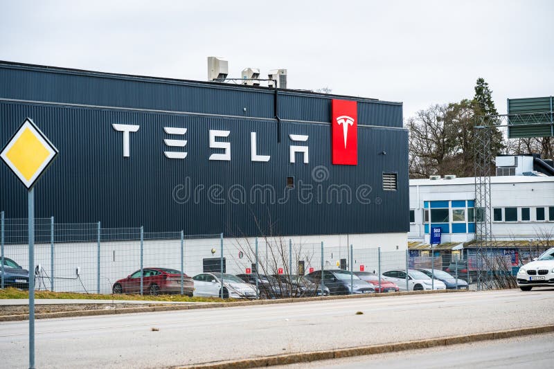 Tesla Logo on the Facade of a Large Workshop.. Editorial Photo - Image ...