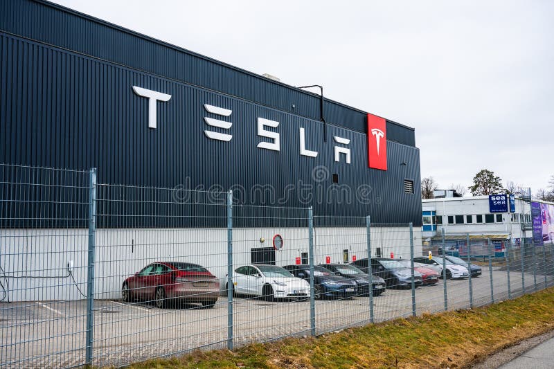 Tesla Logo on the Facade of a Large Workshop.. Editorial Stock Image ...