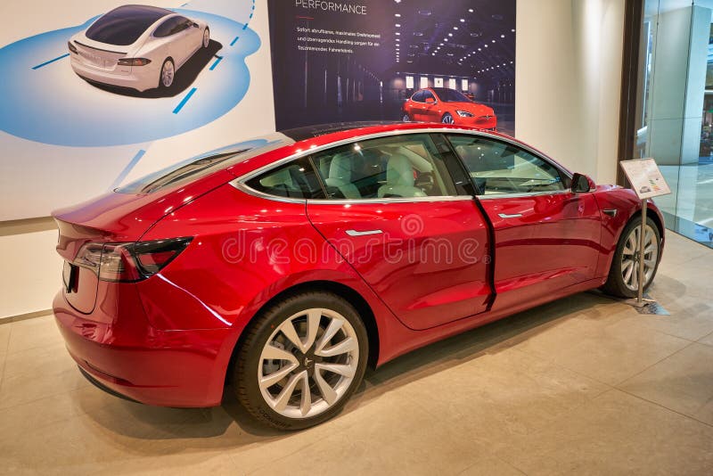 Red Model 3 on Display at Tesla Showroom Editorial Image - Image of ...
