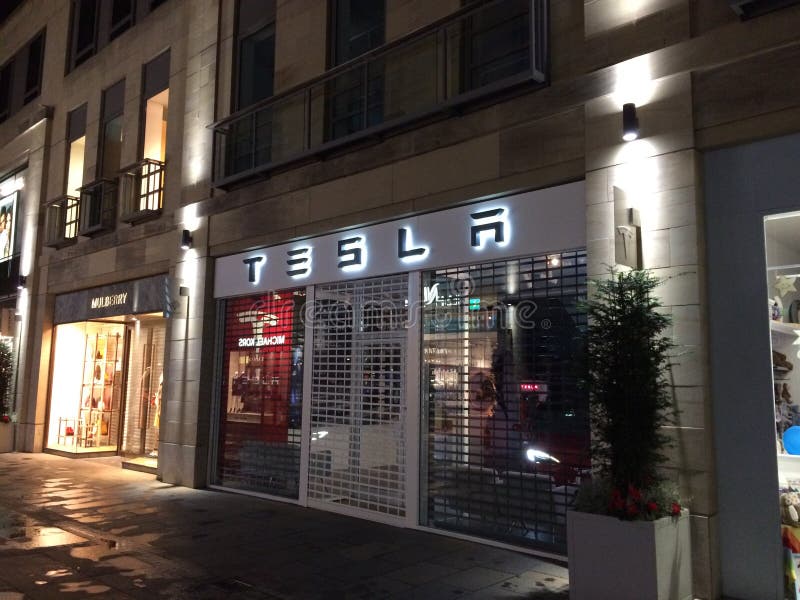 Tesla Store editorial image. Image of business, green - 100400820