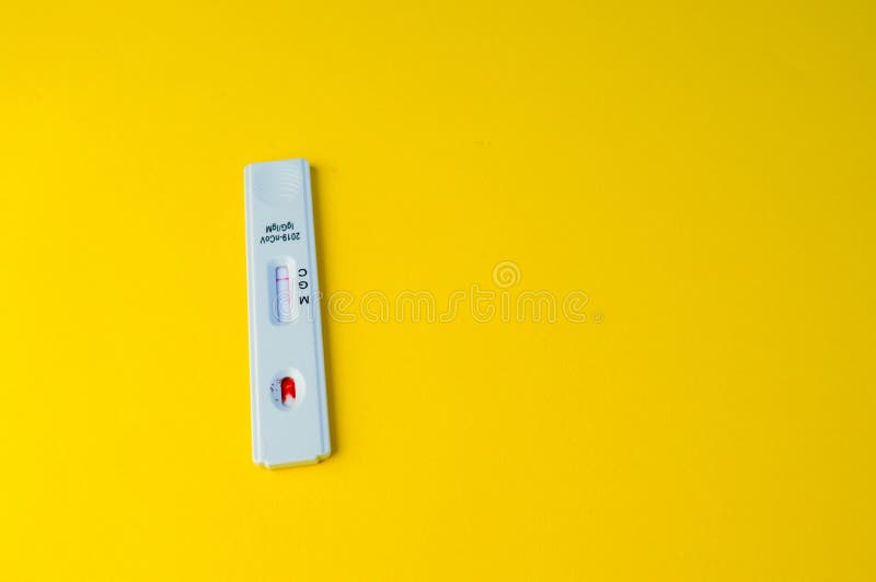 Test for Coronavirus Lies on a Yellow Background. Bright Picture ...