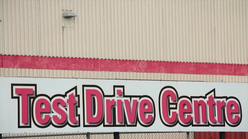 Test Drive Centre Writing Caption Text Horizontal Sign on Fence with ...