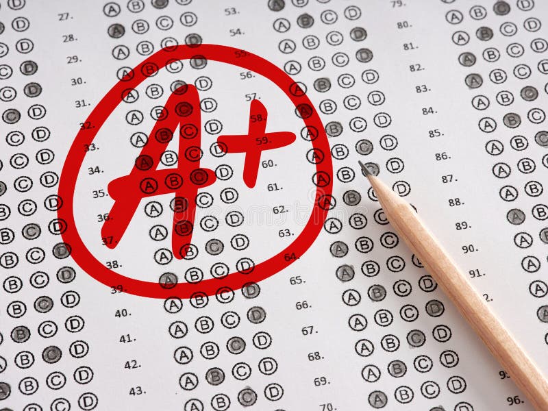 Test Exam Grade a Plus with a Red Circle on a Sheet of Paper with ...