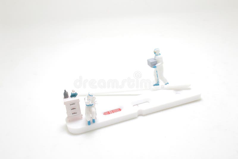 Test Kit for Self Testing with Mini Figure Stock Photo - Image of macro ...