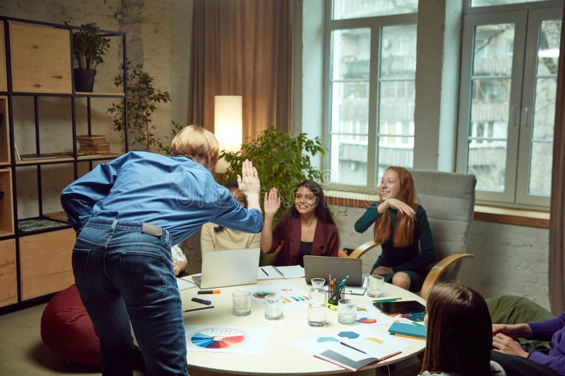 Test Preparation. Young People, Students Site at Table with Laptops and ...