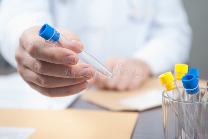 Test tube in doctor hand stock image. Image of proof - 67325005