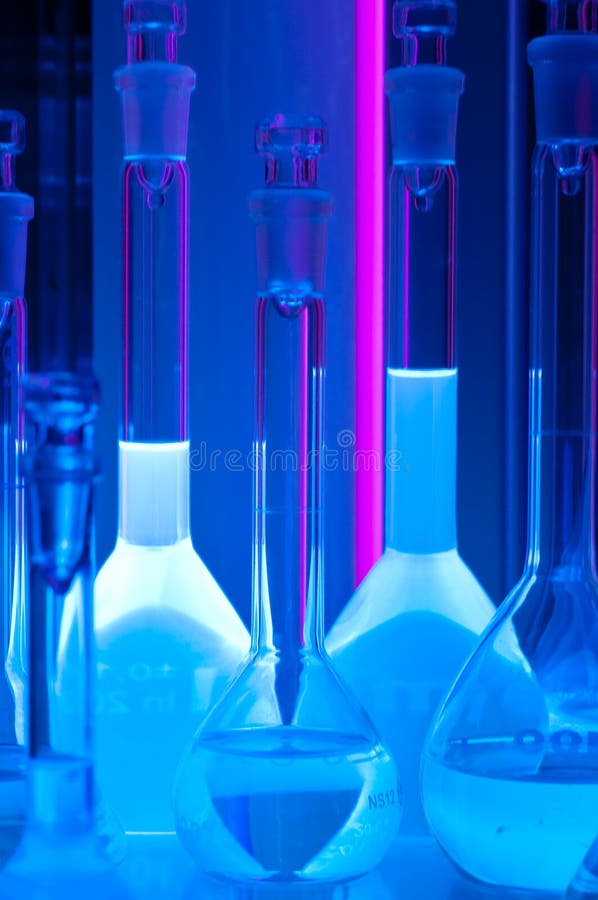 Test tubes in blue light stock photo. Image of education - 10721590