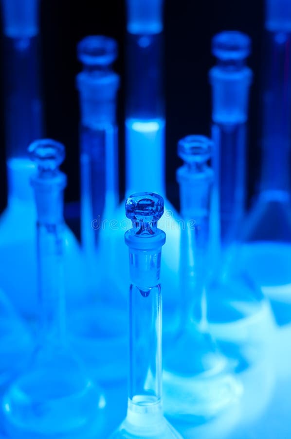 Test tubes in blue light stock image. Image of cylinder - 10721603