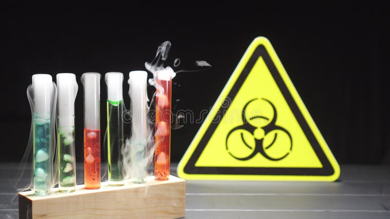 Test Tubes with Boiling Multi-colored Liquid on the Background of the ...