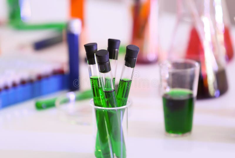 Test Tubes with Color Samples on Table in Modern Laboratory Stock Photo ...