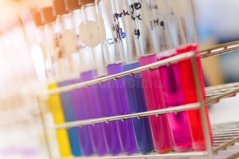 Experiments in Chemistry Laboratory. Test Tubes with Colorful Liquids ...