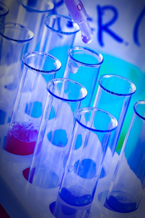 The Test Tubes and Flasks with Colored Liquid in a Laboratory Stock ...