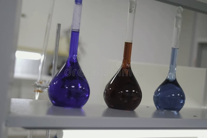 Test Tubes and Flasks with Multi Colored Liquids in the Laboratory ...