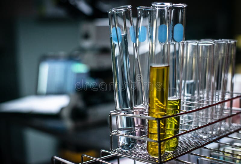 Test Tubes with Yellow Fluid Stock Photo - Image of research, medicine ...
