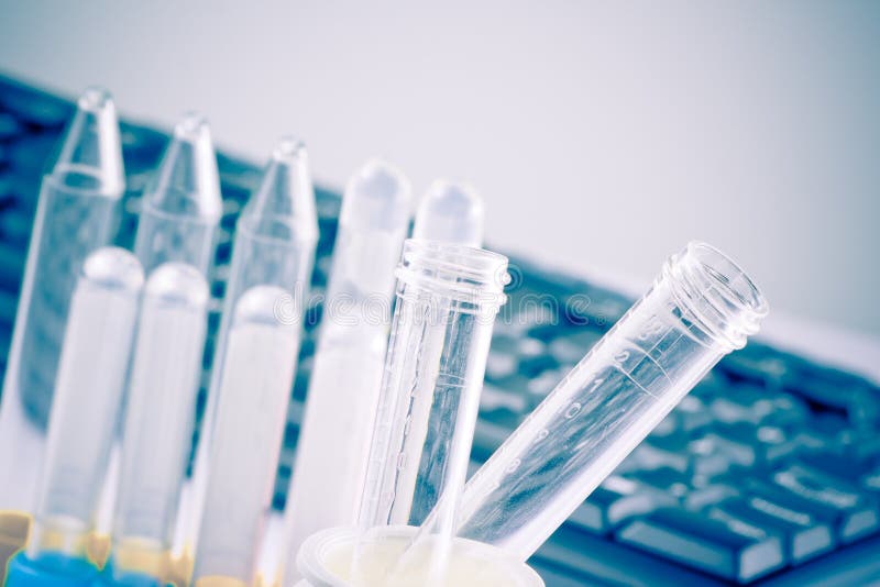 Test Tubes in Laboratory Near Keyboard Stock Photo - Image of drug ...