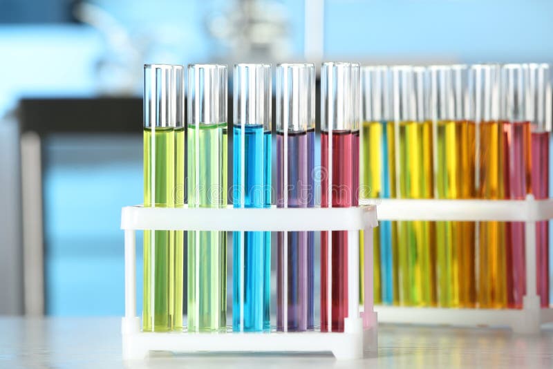 Test Tubes with Liquid Samples on Table. Laboratory Analysis Stock ...