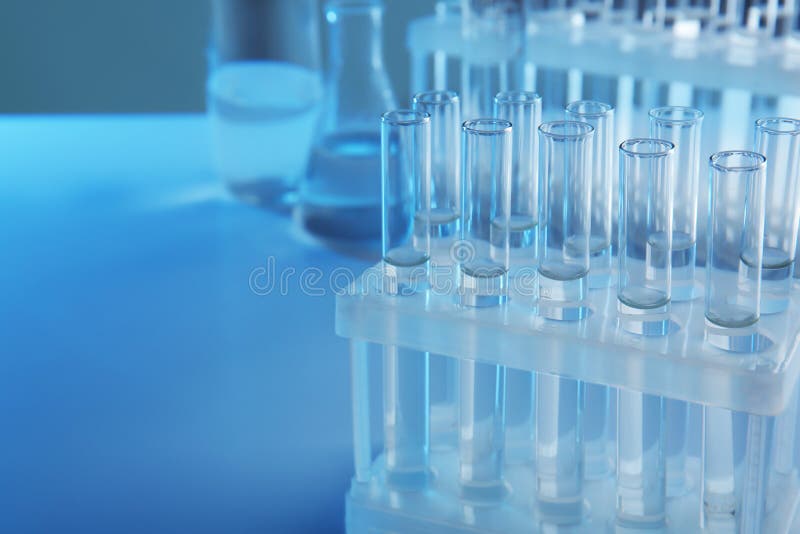 Test Tubes with Liquid in Stand on Table Stock Image - Image of study ...