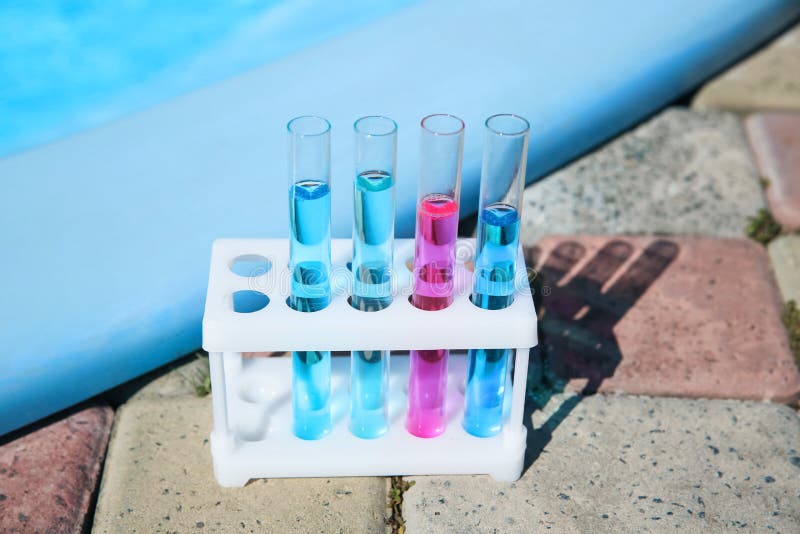 Test Tubes with Reagents in Rack Near Swimming Pool Stock Image - Image ...