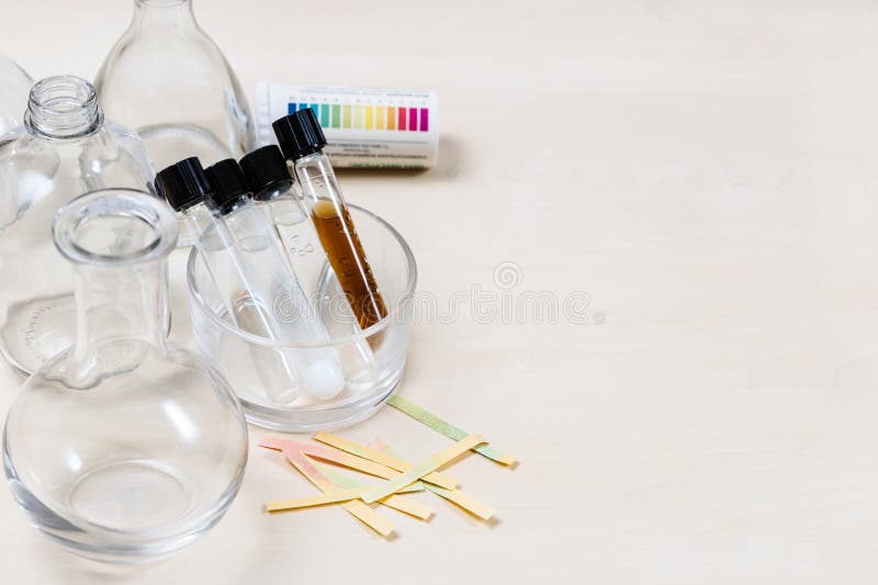 Test Tubes with Various Liquids, Flasks on Table Stock Photo - Image of ...