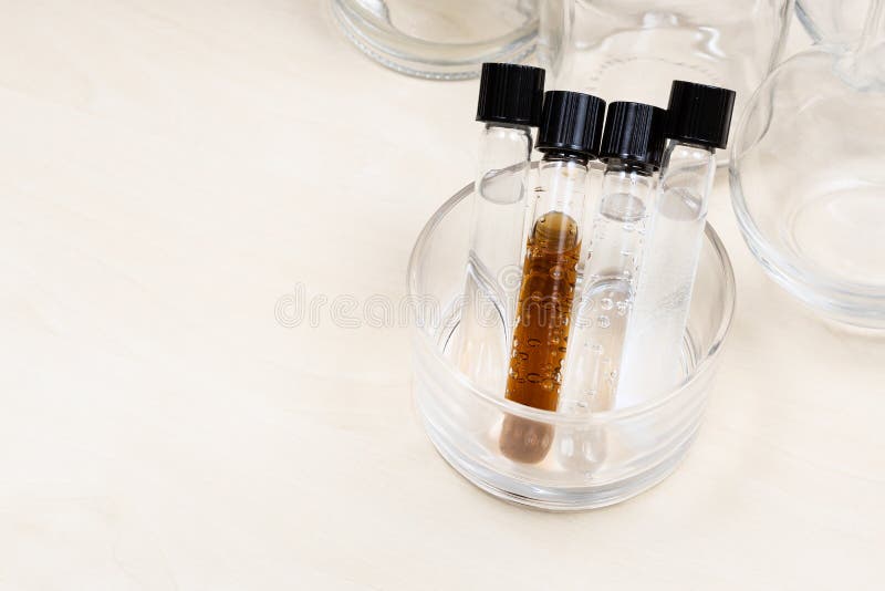 Test Tubes with Various Solutions Near Bottles Stock Photo - Image of ...