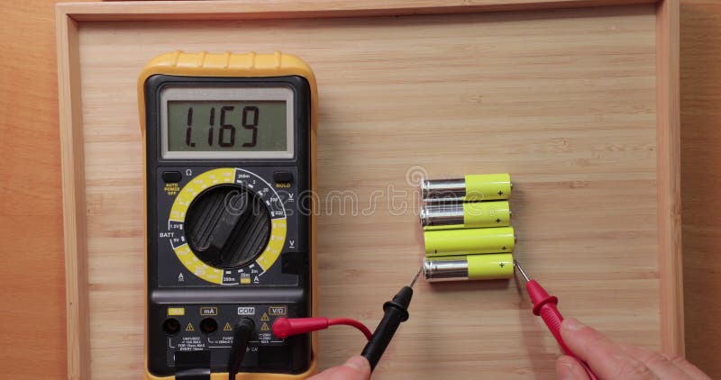 AA Battery Cells Voltage Checking Stock Footage - Video of device ...