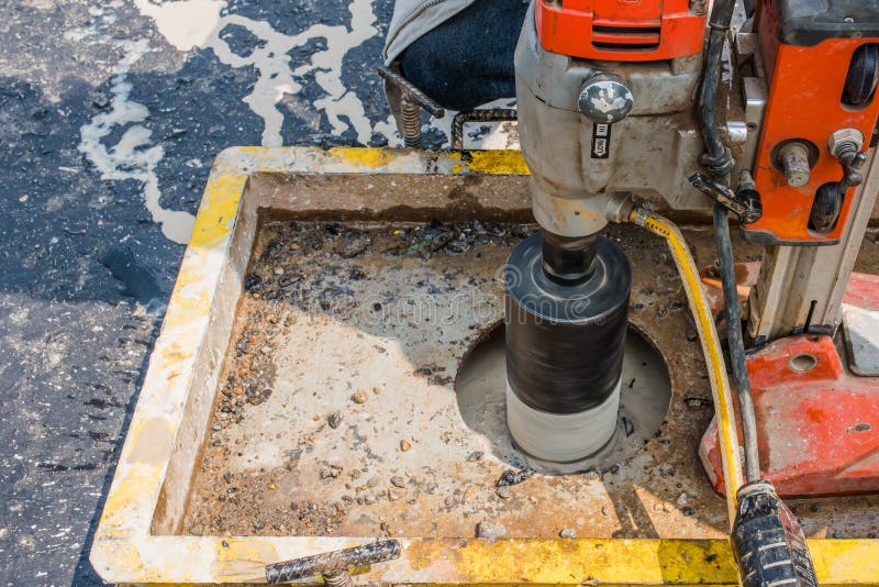 Testing for Compaction Using Coring Stock Photo - Image of pavement ...