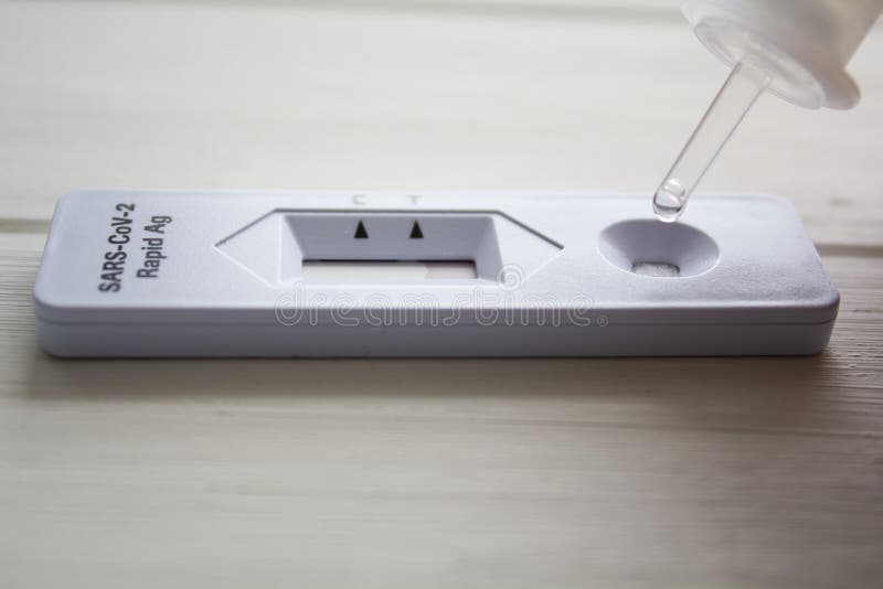Testing for Covid-19 at Home with Rapid Test Kit, Self Test Kit Stock ...
