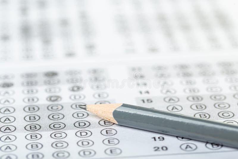 Testing in Exercise and Exam Paper. Computer Sheet with Pencil in ...